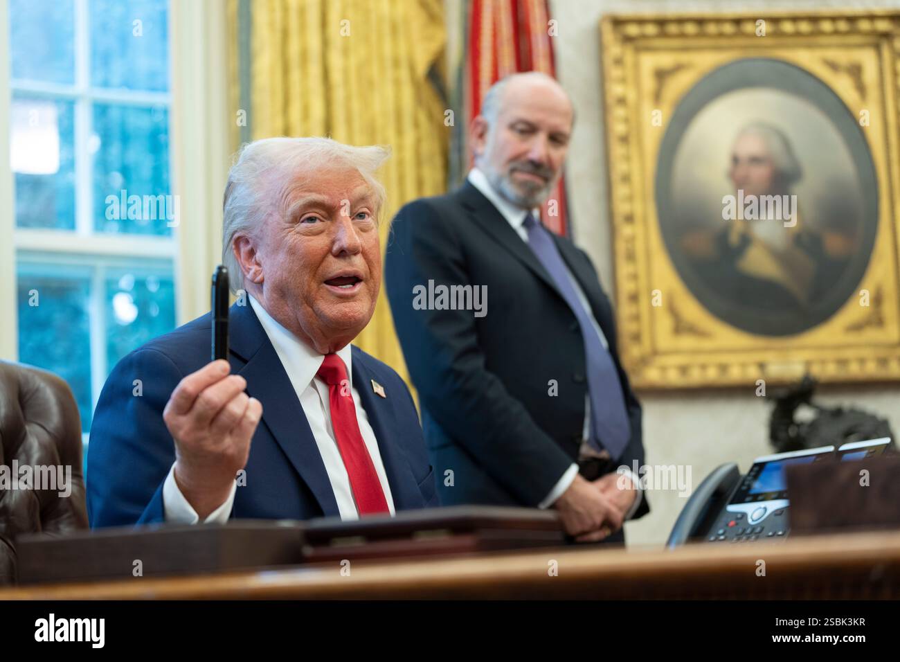 United States President Donald J Trump uses a pen as a prop while ...