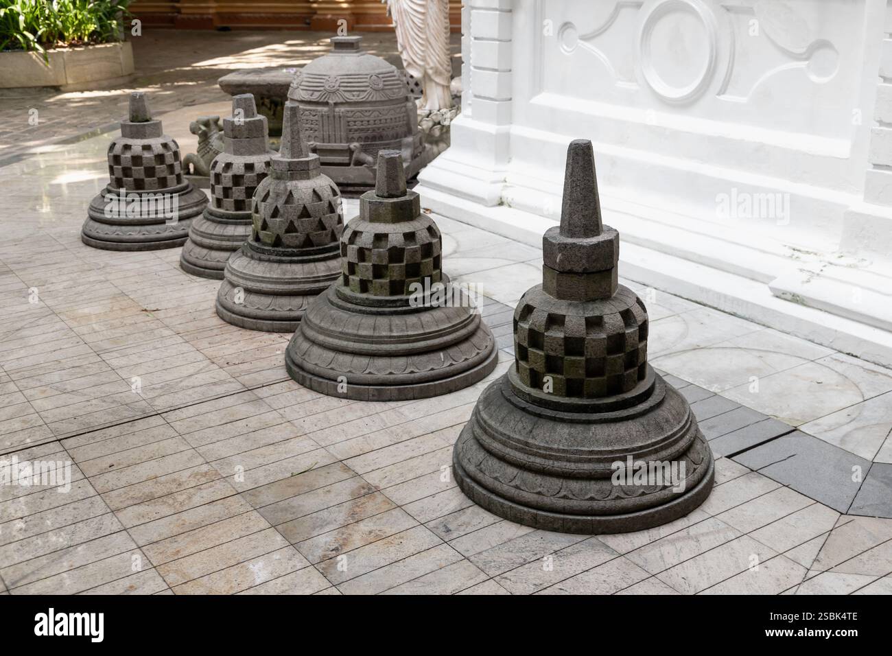 Stone bell-shaped stupas at Gangaramaya Temple, Colombo, Sri Lanka ...