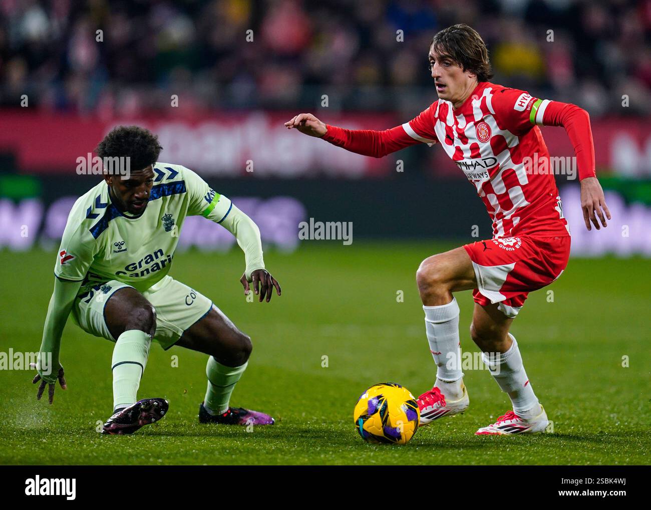Brian Gil of Girona FC and Pelmard of UD Las Palmas during the La Liga ...