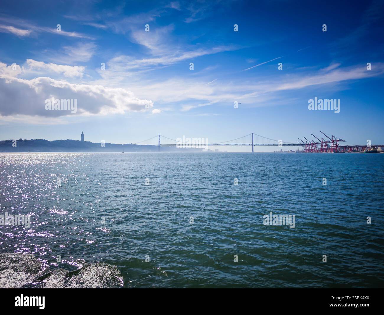 25 April Bridge and Cristo Rei Statue, Tagus river. Panoramic view ...