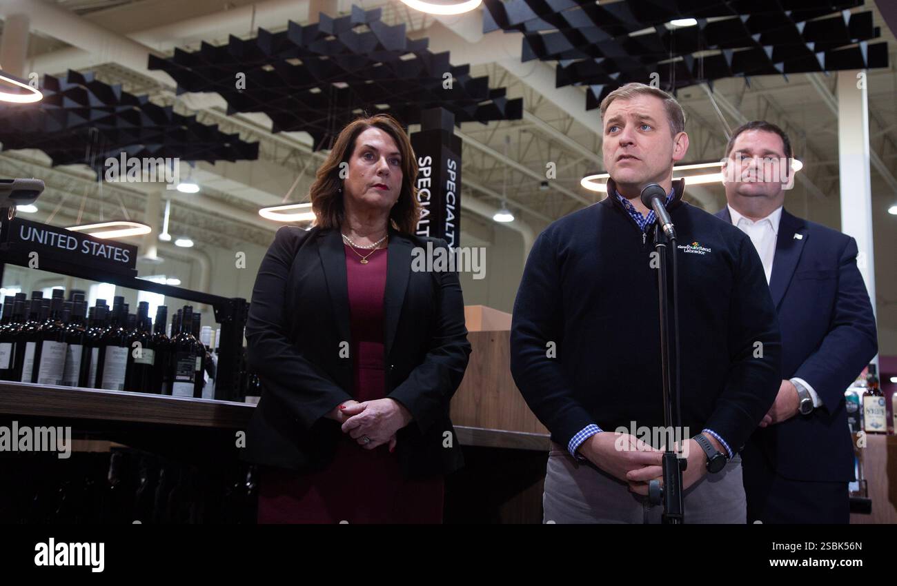 Premier Andrew Furey, centre, flanked by Deputy Premier Siobhan Coady ...