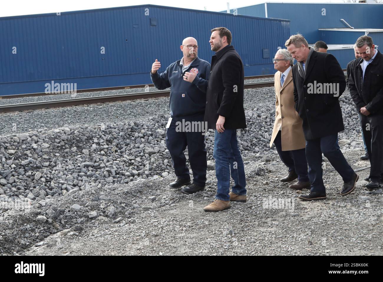 Vice President JD Vance, center, speaks with East Palestine Fire Chief ...