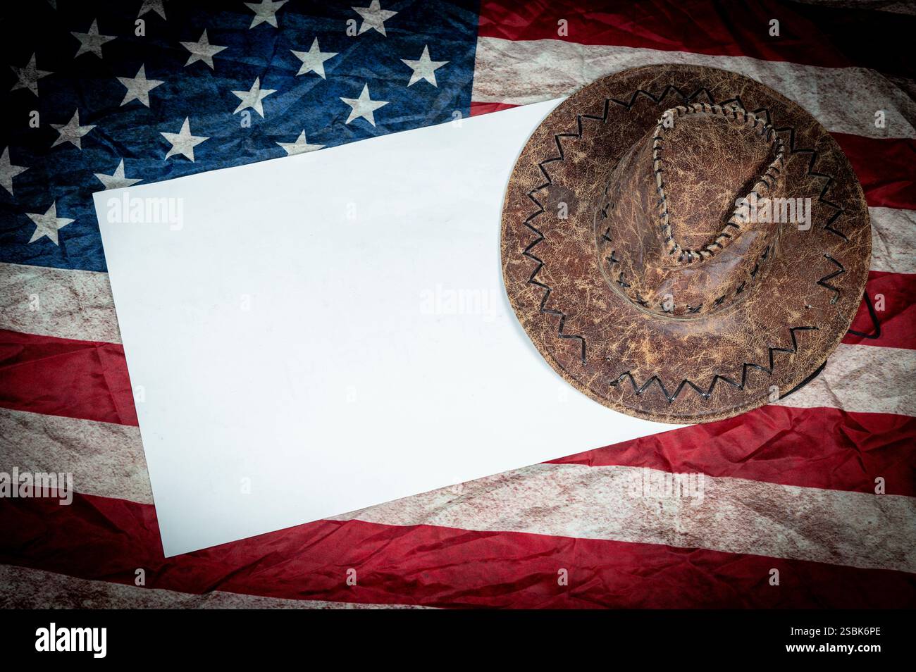 Vintage cowboy hat with white banner space Stock Photo - Alamy