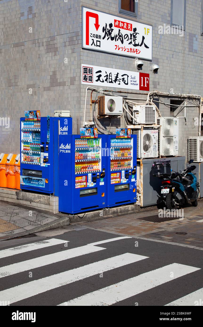 Drink vending machines outside an apartment building in Asakusa, Tokyo ...