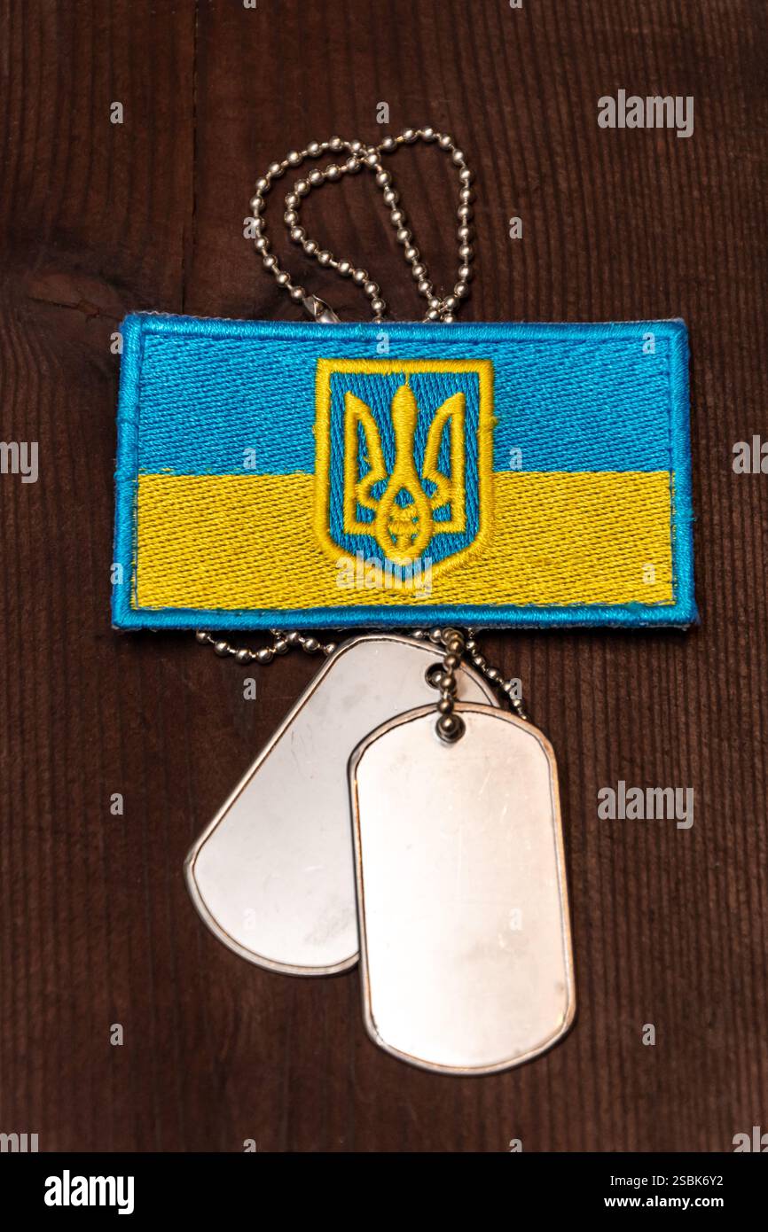 Soldier's badges and the national flag of Ukraine - a symbol of ...