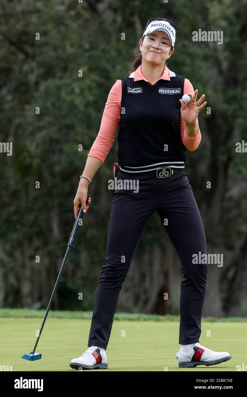 A Lim Kim, of South Korea, waves to the crowd after she finished ...
