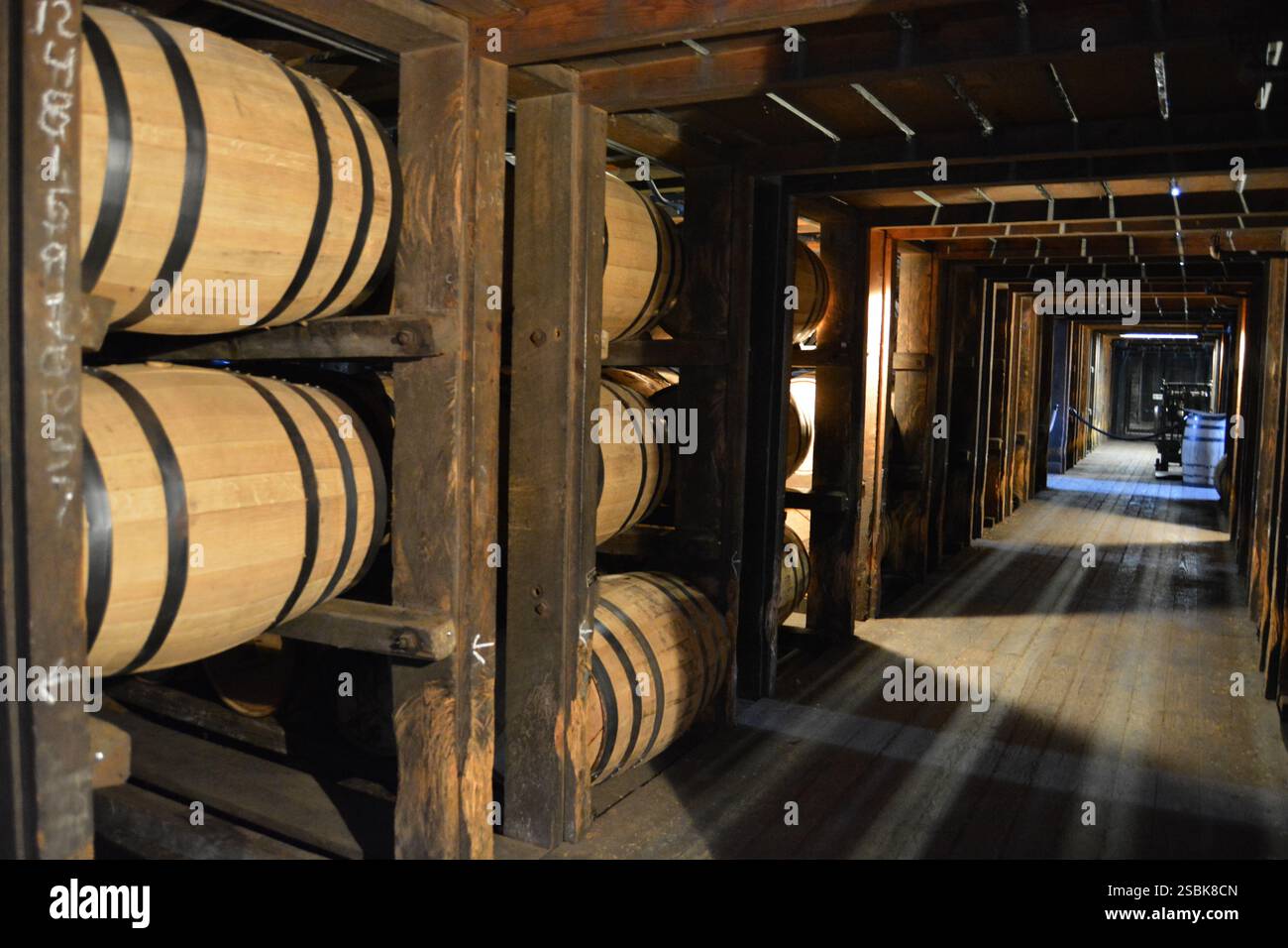 Bourbon Whiskey Barrels inside a warehouse Stock Photo - Alamy