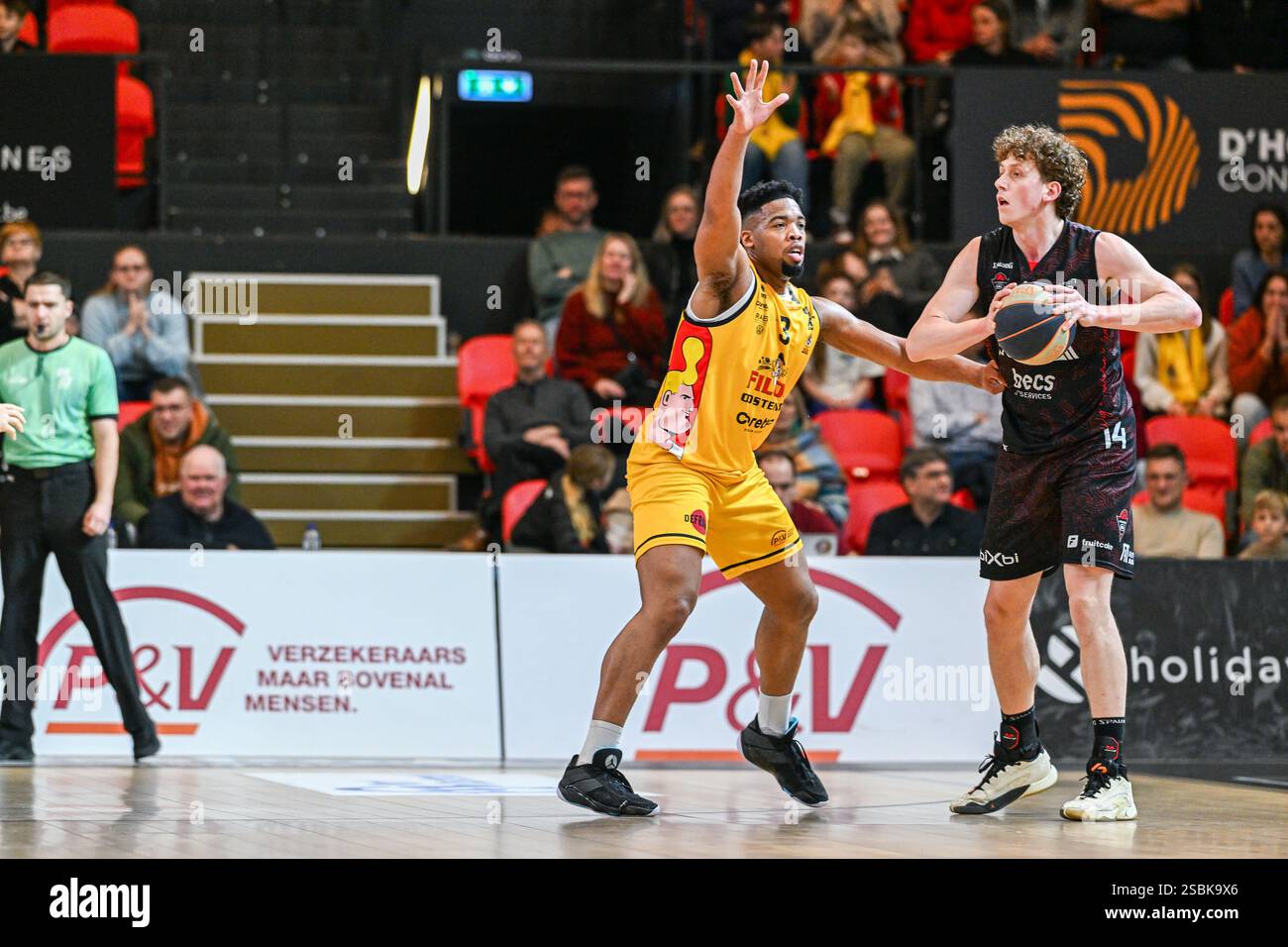 EJ Anosike (3) of Filou Oostende and Niels van Holst (14) of Basket ...