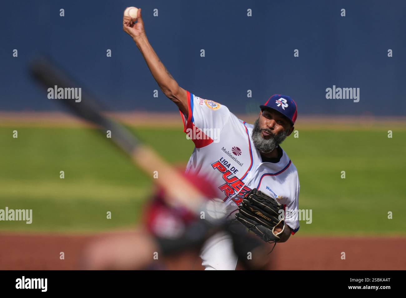 Puerto Rico's pitcher Daryl Thompson throws against Venezuela's ...