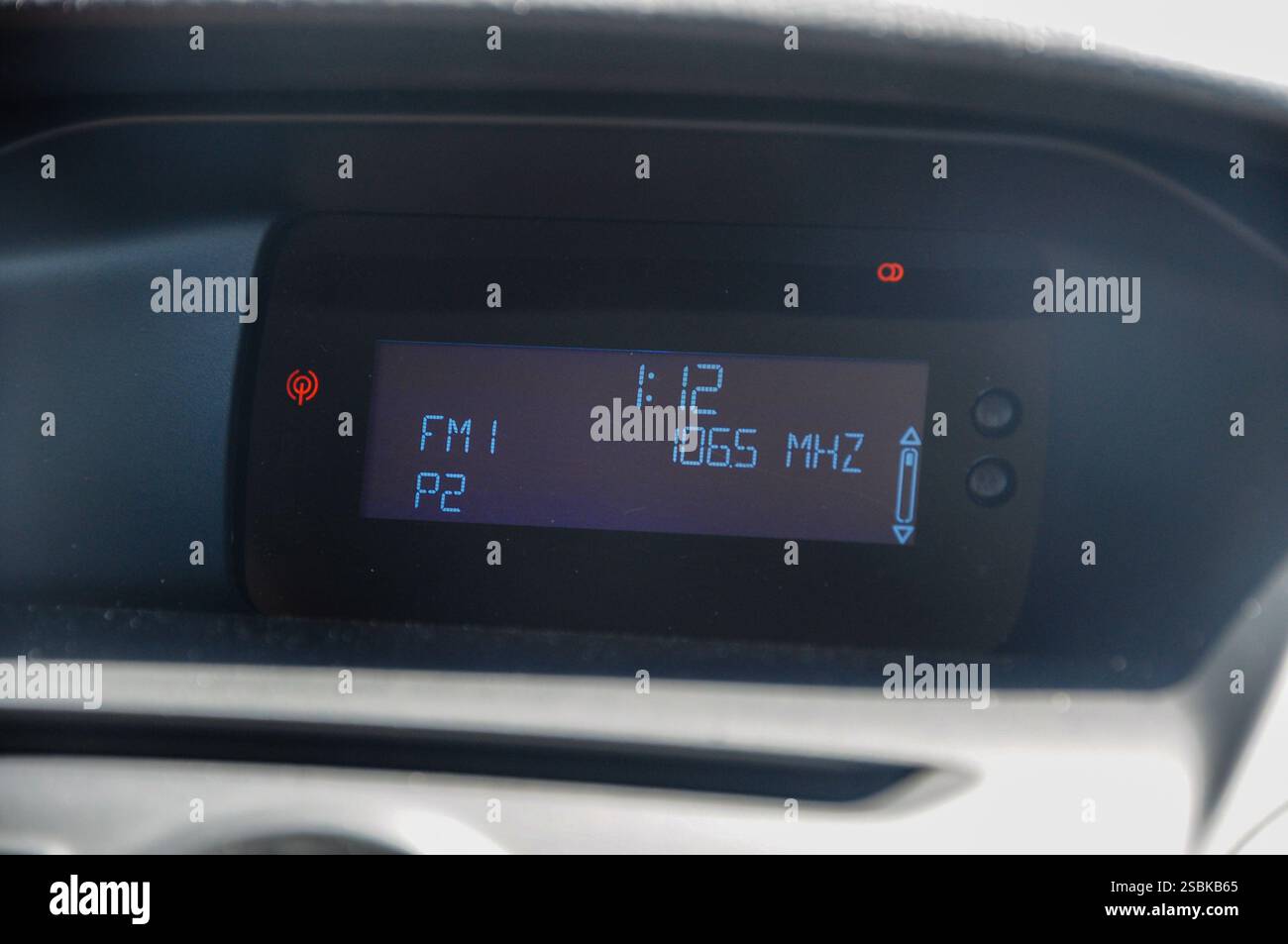 Car dashboard with digital clock and radio display Stock Photo - Alamy
