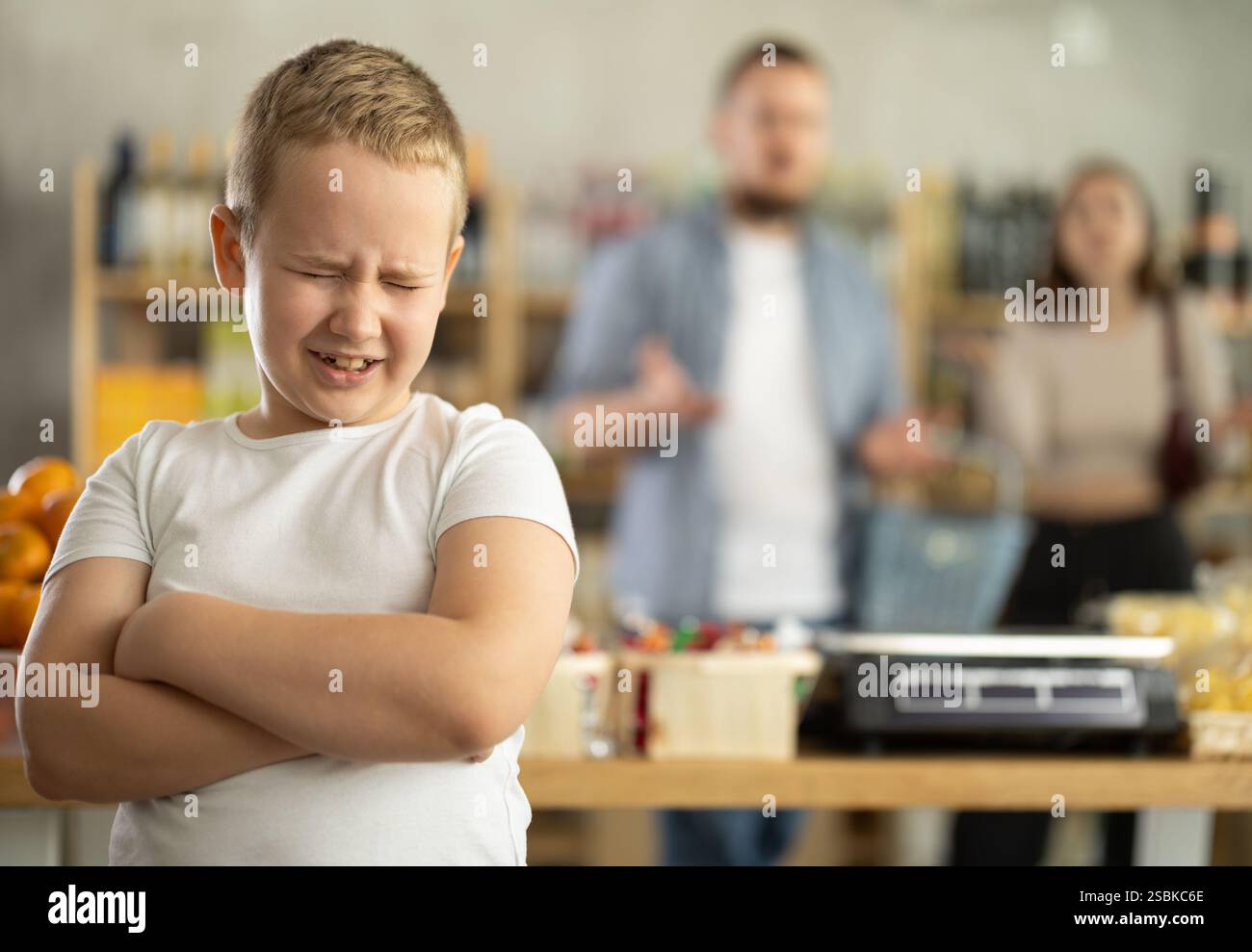 Capricious preteen boy screaming loudly in grocery store Stock Photo ...
