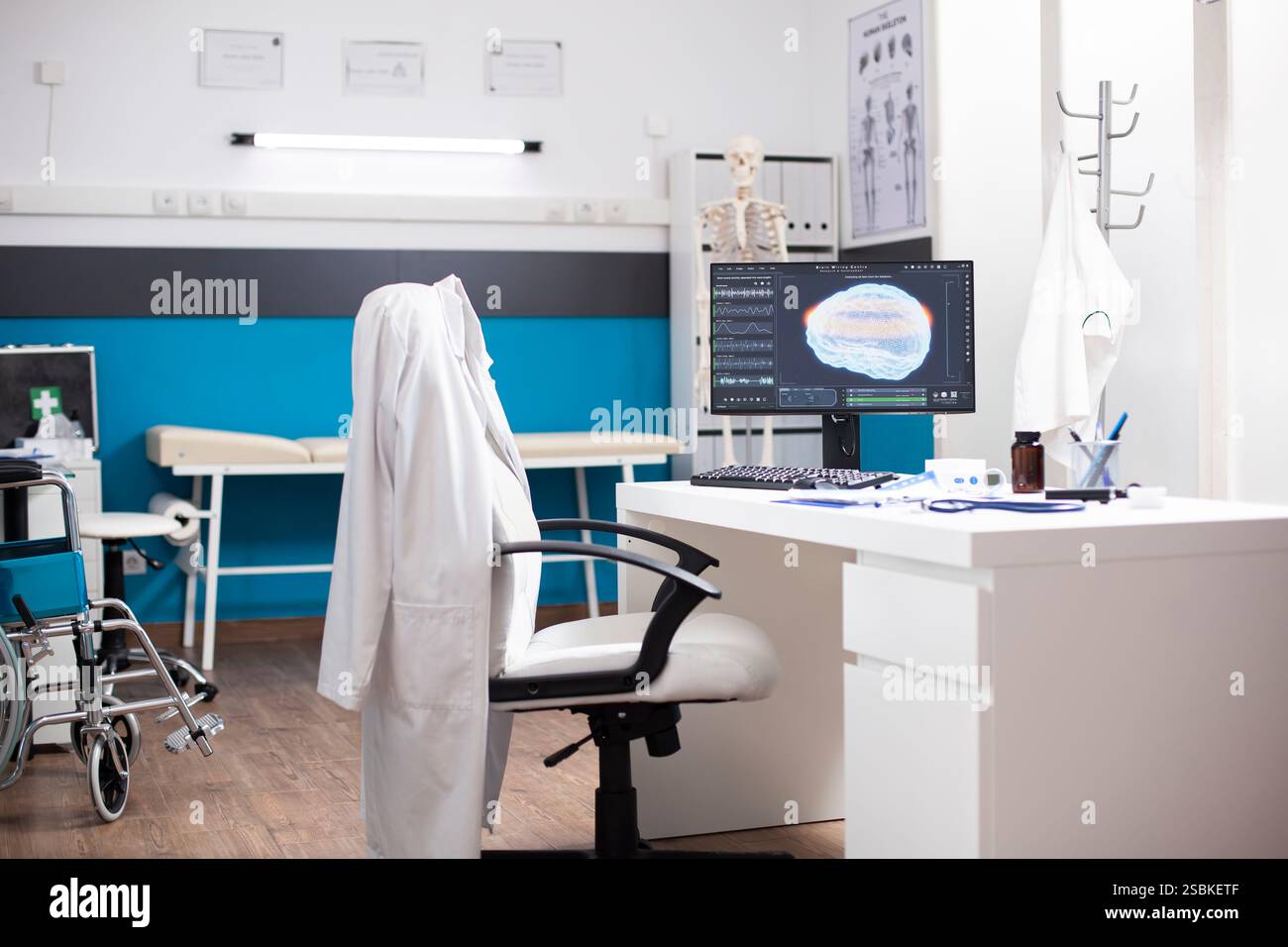 Modern clinic workstation features desktop pc displaying brain scan ...
