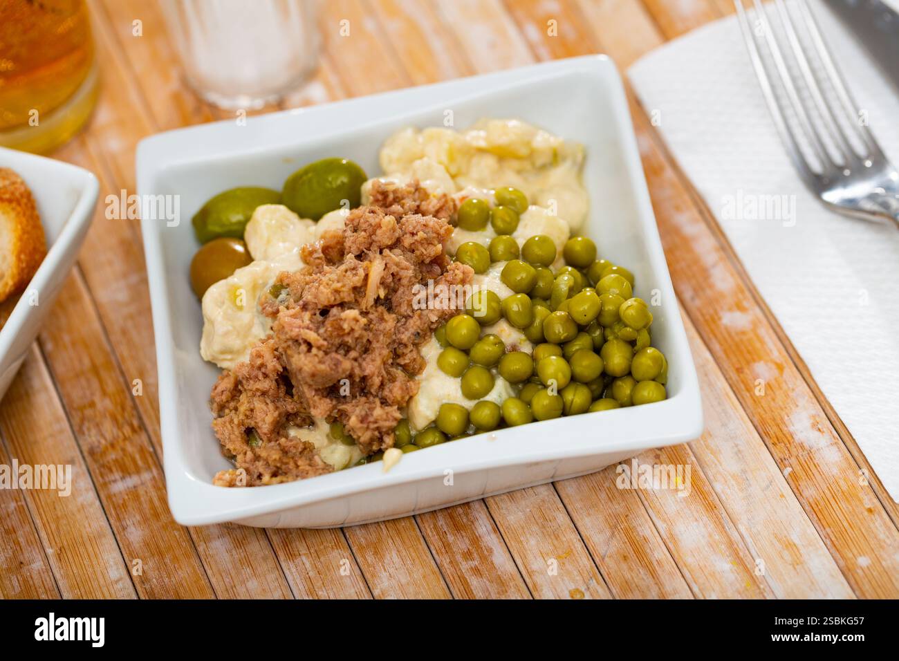 Spanish salad called Ensalada rusa Stock Photo - Alamy