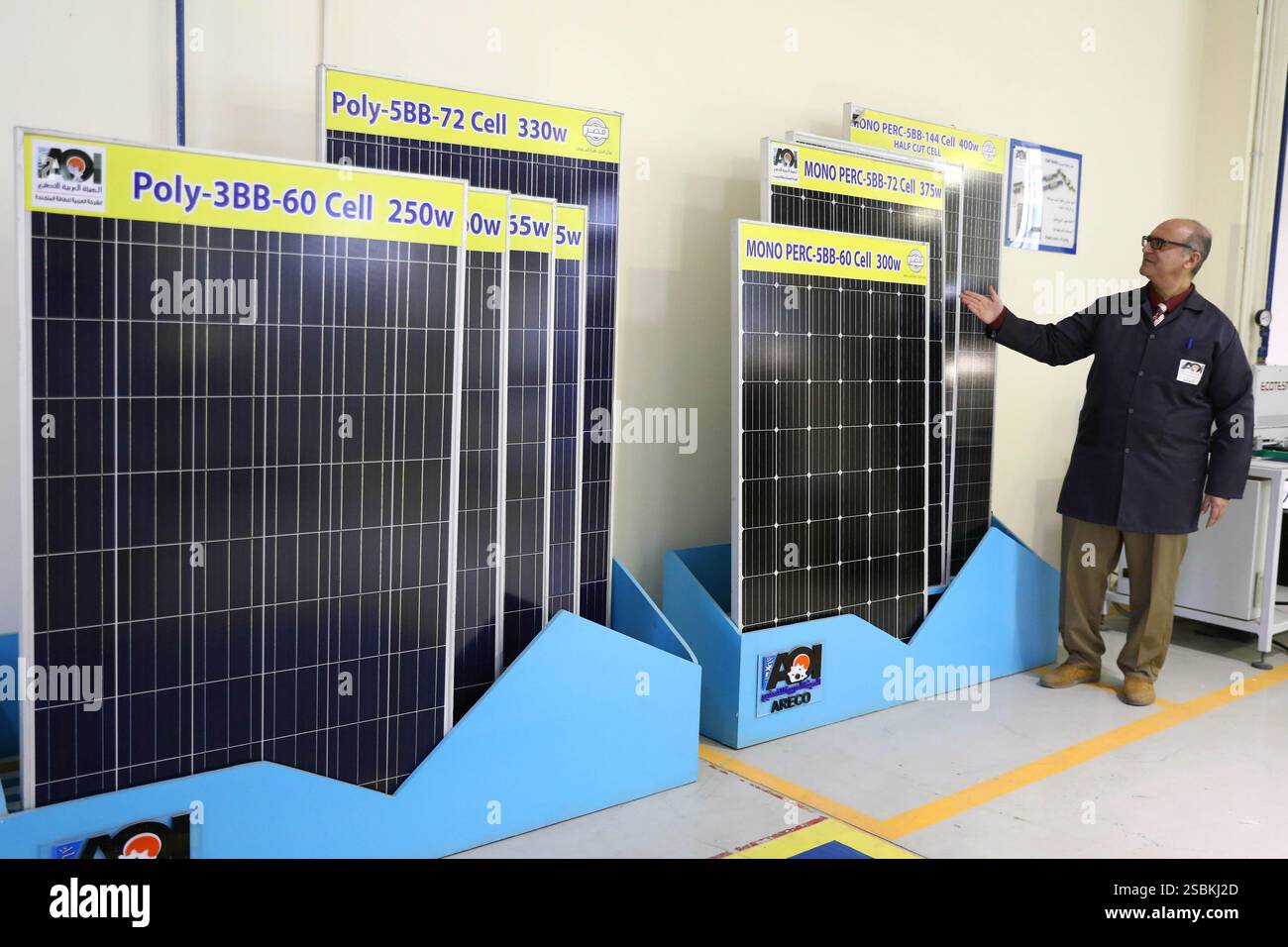 Cairo, Egypt. 1st Feb, 2025. A man shows solar panels at a solar panel ...