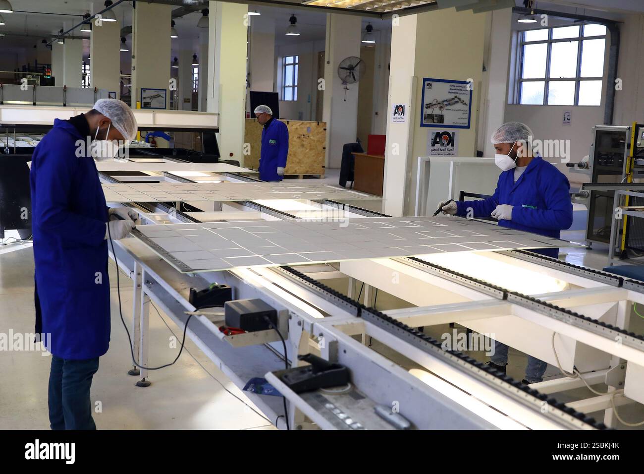 Cairo, Egypt. 1st Feb, 2025. People work at a solar panel factory in ...