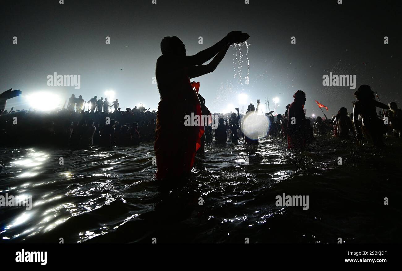PRAYAGRAJ, INDIA - FEBRUARY 3: Naga Sadhu taking a holy dip during the ...