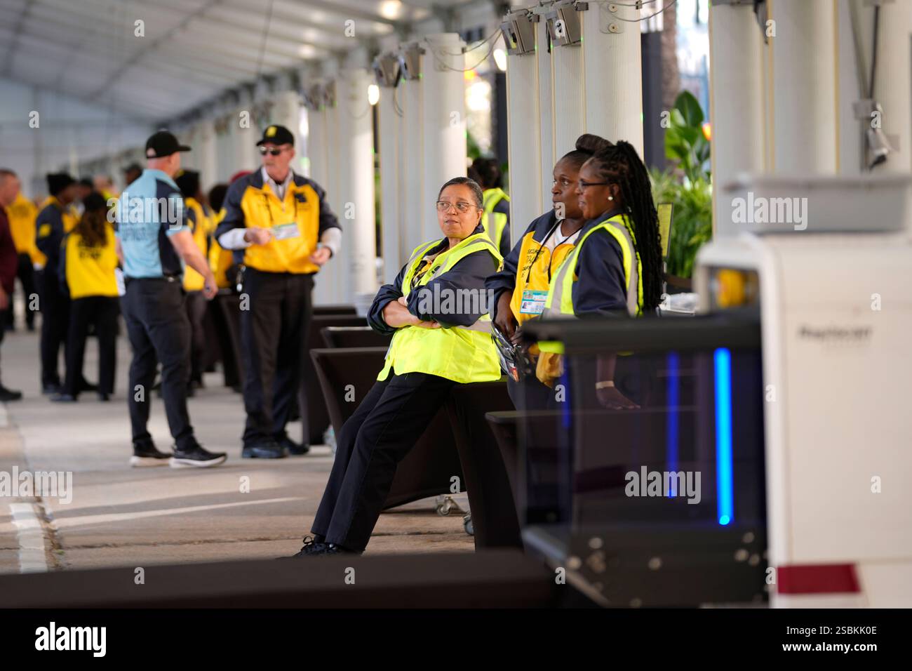 CORRECTS DATE OF SUPER BOWL - Security personnel wait at a security ...