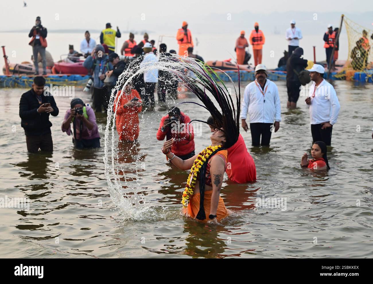PRAYAGRAJ, INDIA - FEBRUARY 3: Female Sanyasini taking a holy dip ...