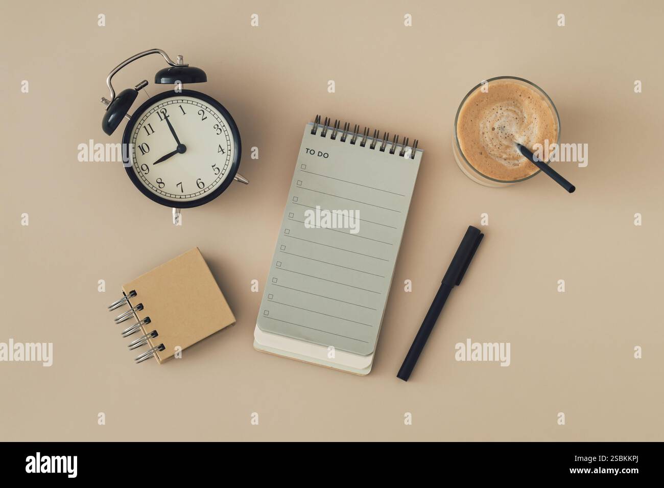 Coffee, To do list notepad, black pen and retro alarm clock. Planner ...