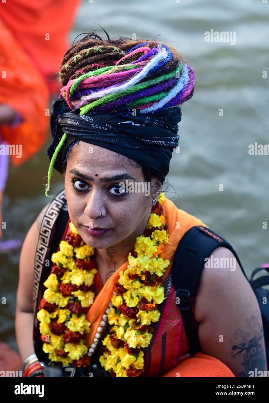 PRAYAGRAJ, INDIA - FEBRUARY 3: Female Sanyasini after taking a holy dip ...