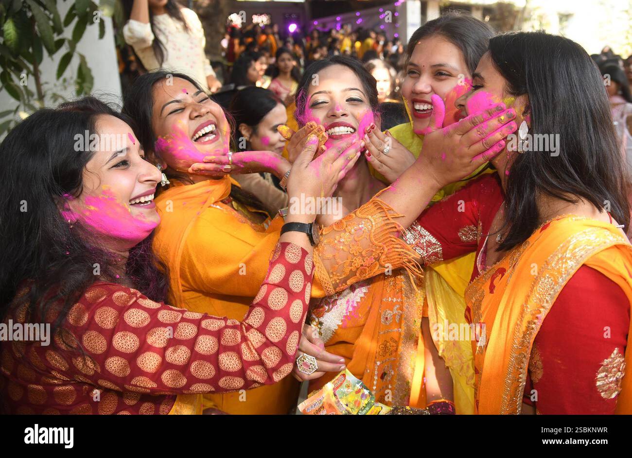 PATNA, INDIA - FEBRUARY 3: Students applying 'Abeer-Gulal' to each ...