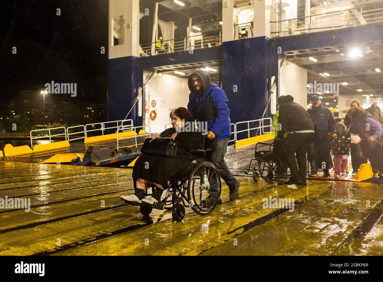 Pireaus, Greece. 04th Feb, 2025. People disembark from a ferry in the ...