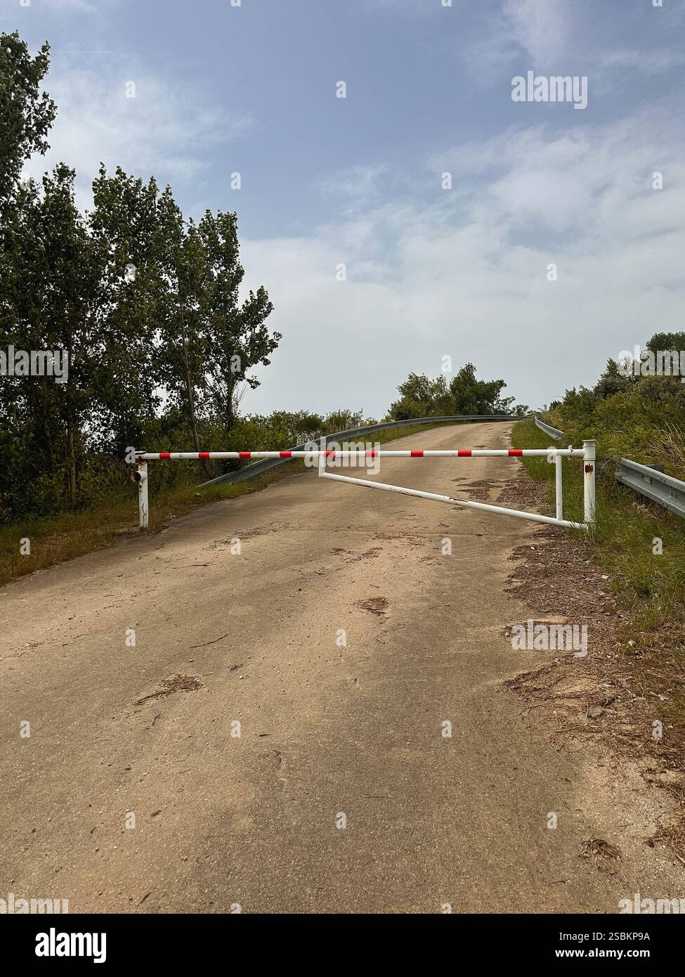 Closed Road Barrier on Rural Pathway Stock Photo - Alamy