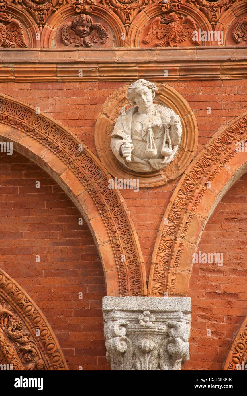 Detail of the ornate red brick exterior of the Ca' Granda old hospital ...