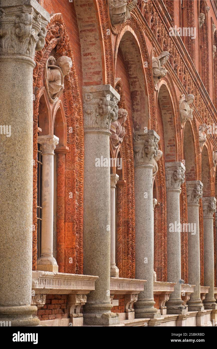 Ornate red brick exterior of the Ca' Granda old hospital building ...