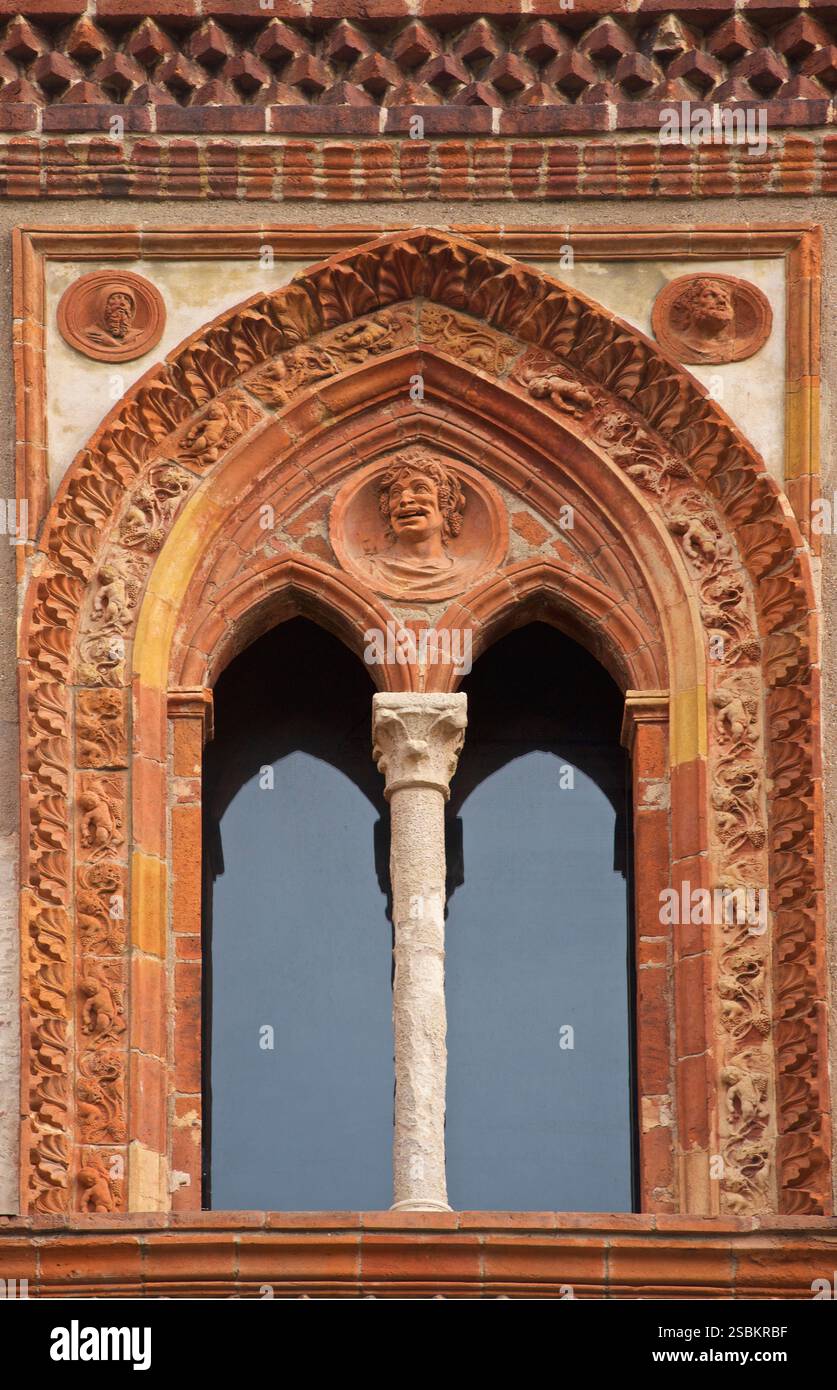 Detail of the ornate red brick exterior of the Ca' Granda old hospital ...