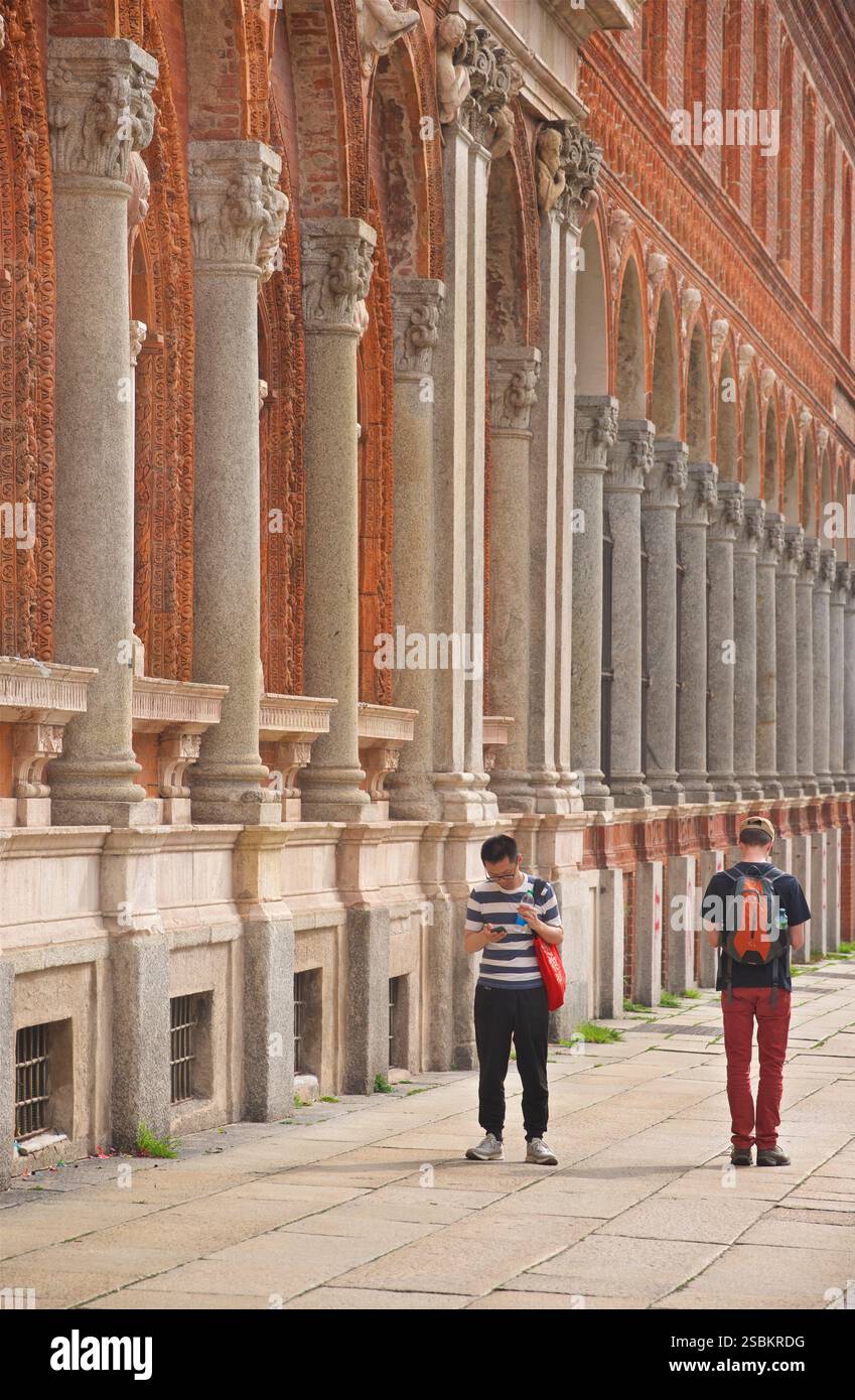 Ornate red brick exterior of the Ca' Granda old hospital building ...