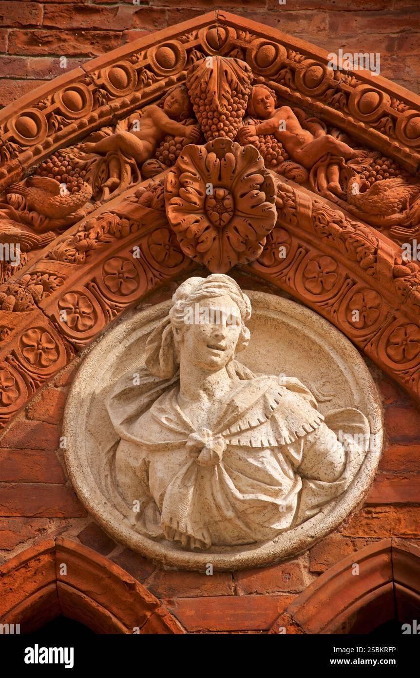 Detail of the ornate red brick exterior of the Ca' Granda old hospital ...