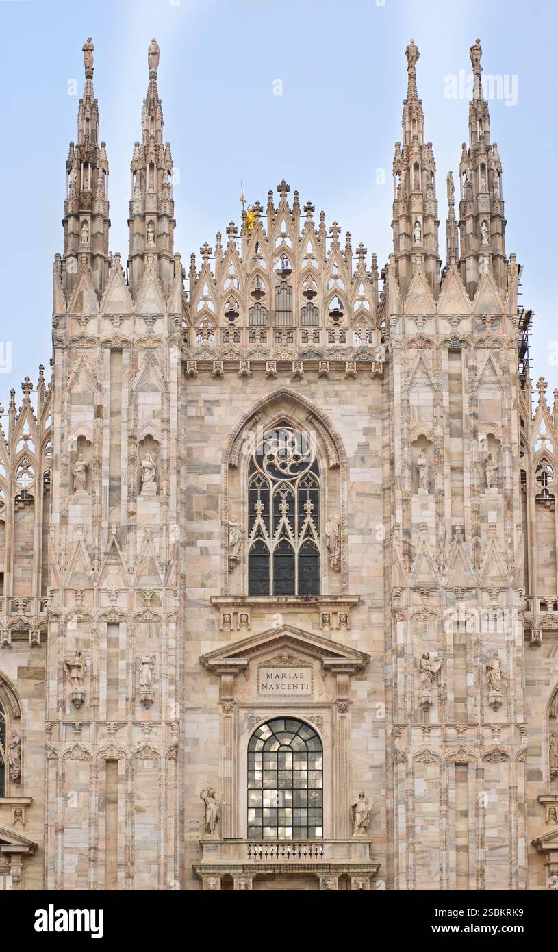 Detail of carved stone masonry of the front facade of Milan Cathedral ...