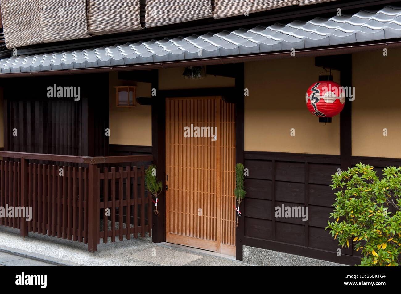 Typical Kyoto machiya (2-story townhouse) with "koshi" lattice windows ...