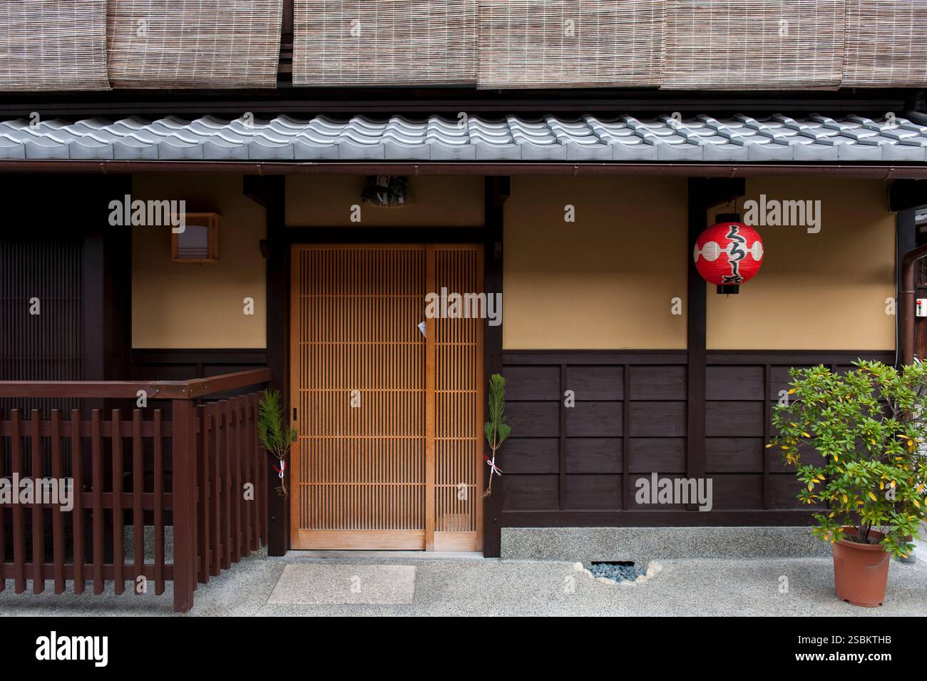 Typical Kyoto machiya (2-story townhouse) with "koshi" lattice windows ...