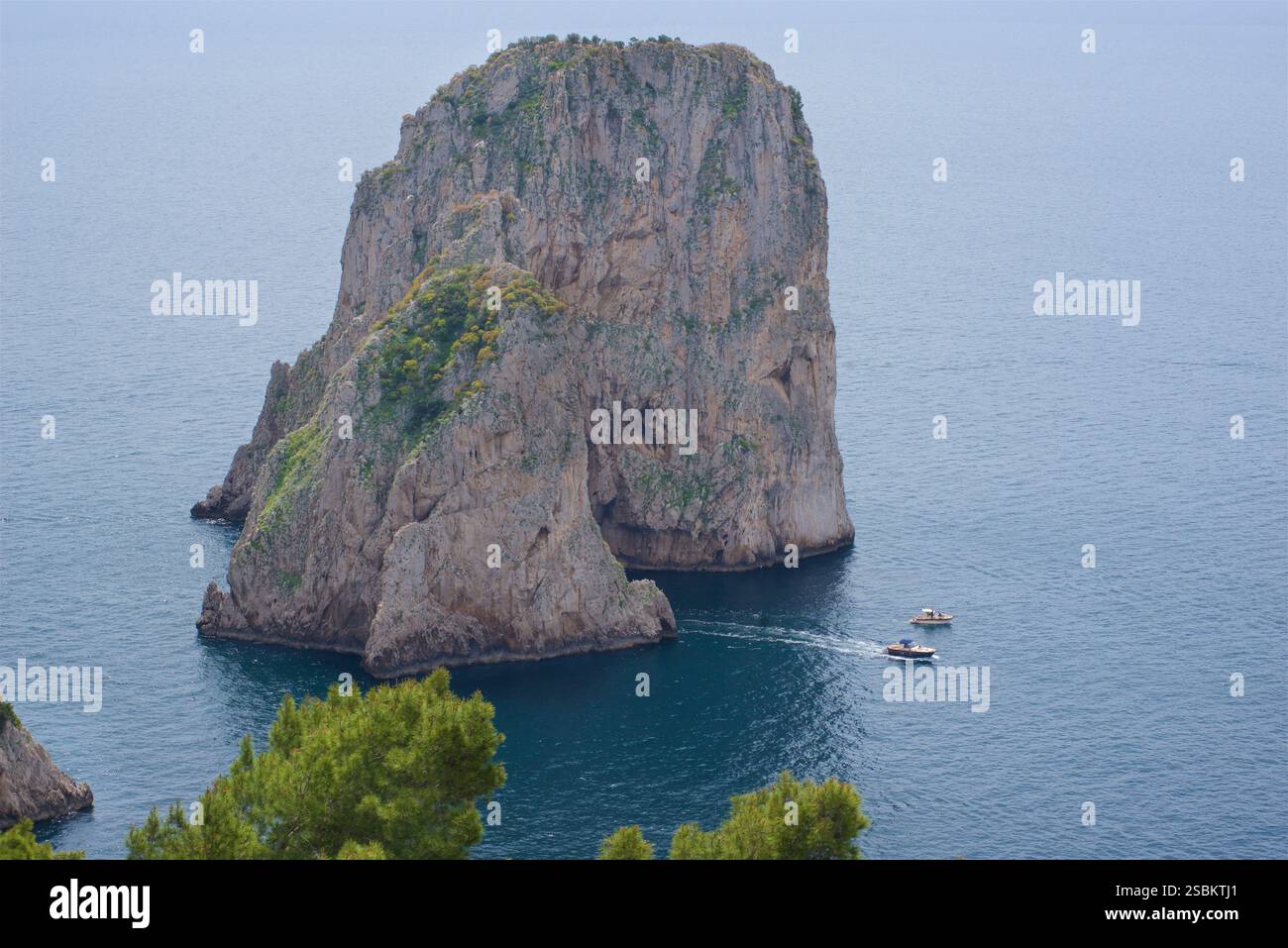 The Capri faraglioni are three small rocky islets (stacks) in the Bay ...