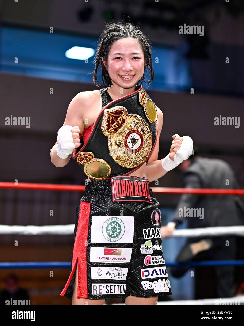 Japan's Yuko Kuroki poses with her championship belt after winning the vacant WBA Female Minimum ...