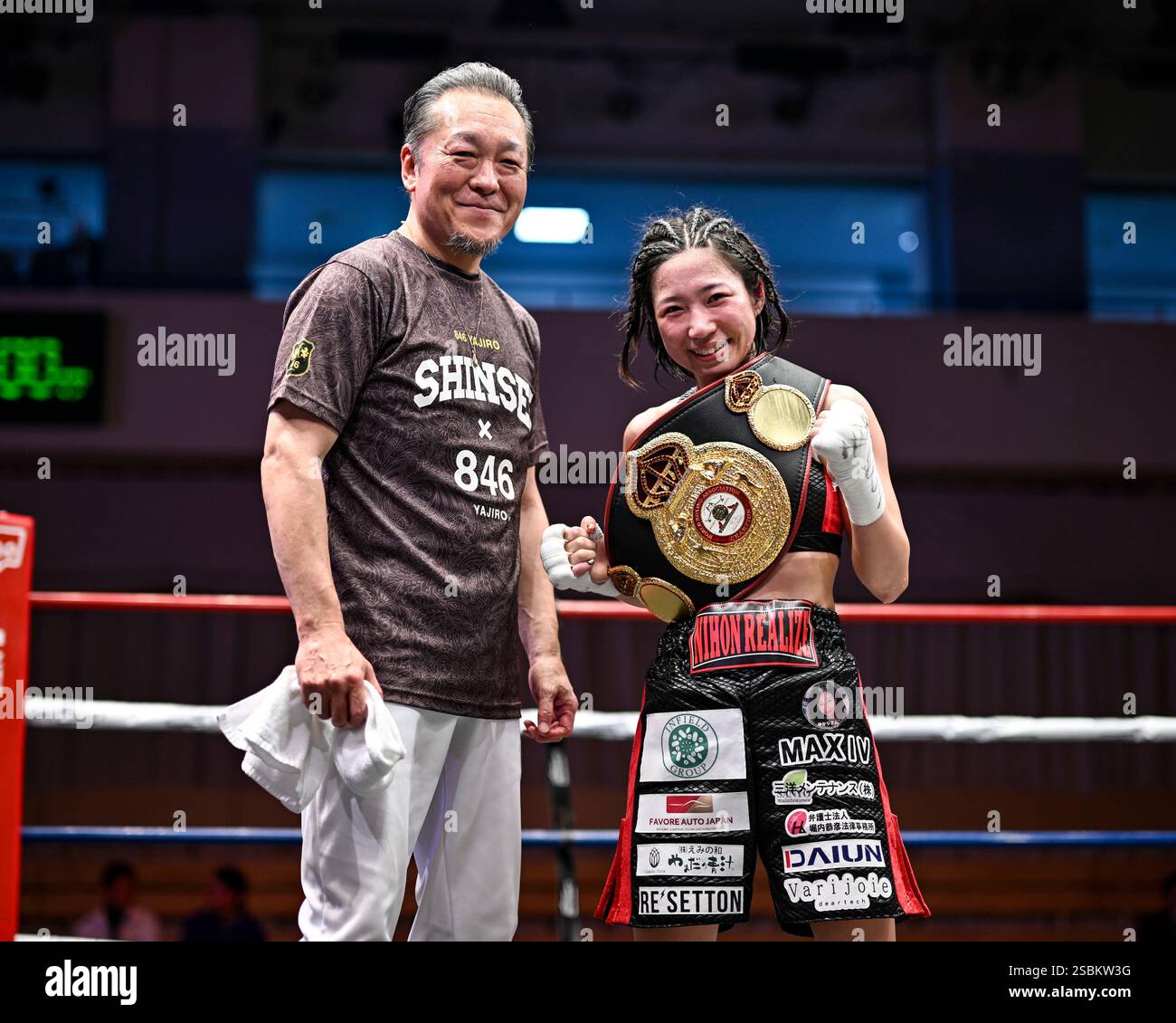 Japan's Yuko Kuroki, right, poses with Shinsei Boxing Gym chairman Masato Yamashita after ...