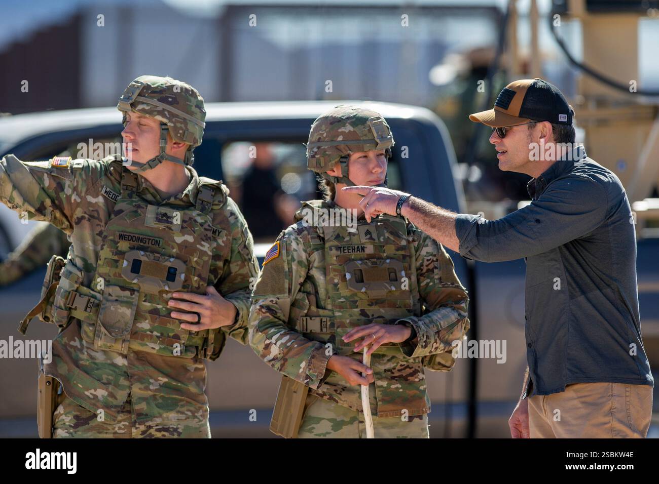 Defense Secretary Pete Hegseth, right, speaks as he's briefed by Army ...