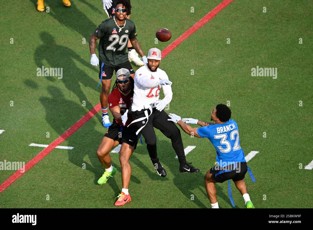 AFC running back Joe Mixon (28), of the Houston Texans, pitches the ...