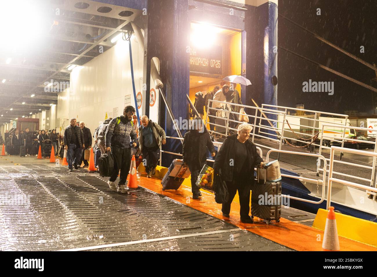 Pireaus, Greece. 04th Feb, 2025. People disembark from a ferry in the ...