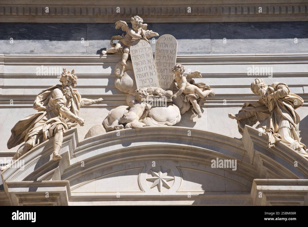 Detail of the facade of Chiesa dei Girolamini. Baroque sculptures above ...