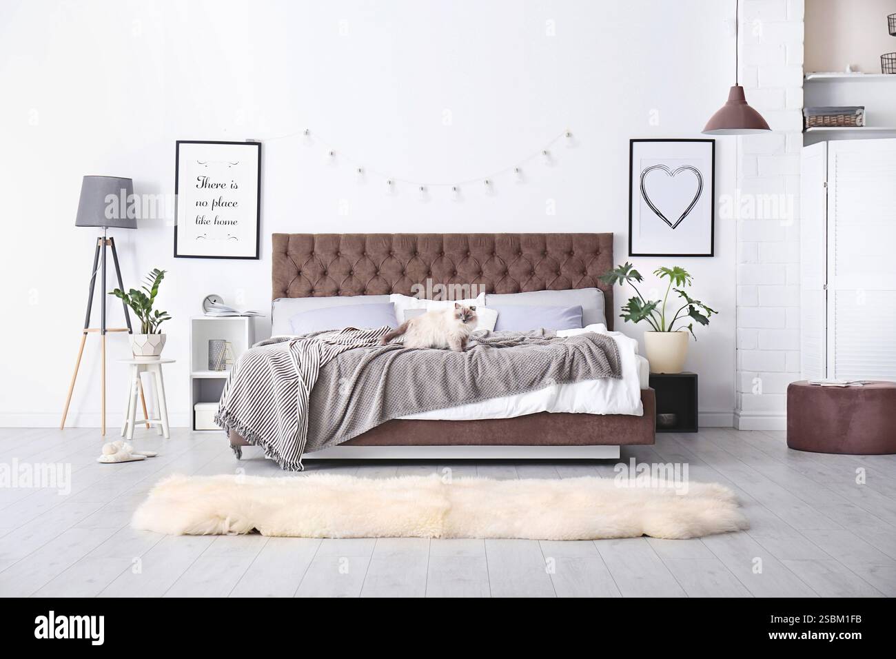 Cozy bedroom interior with mocha mousse shade. Trendy color of 2025 ...