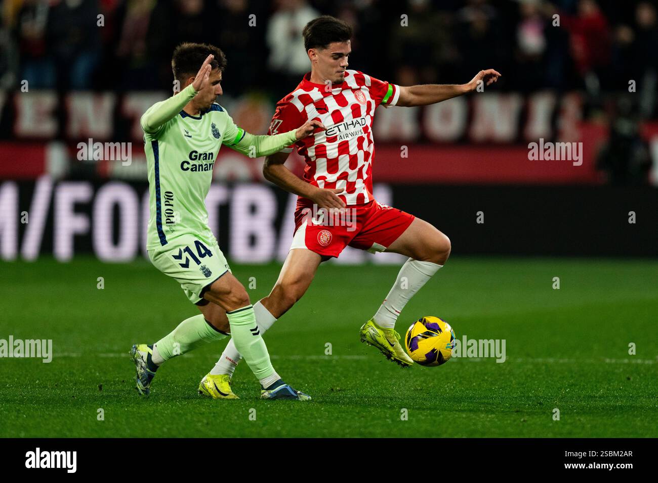 Girona, Spain. 3rd Feb, 2025. Miguel Gutierrez (Girona FC) duels for ...