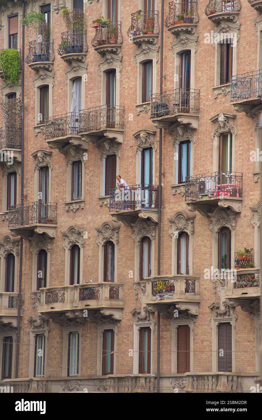 Apartment buildings and their many windows, Turin, Italy Stock Photo ...