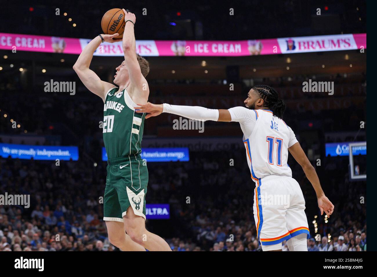 Milwaukee guard AJ Green (20) looks to shoot in front of Oklahoma City ...