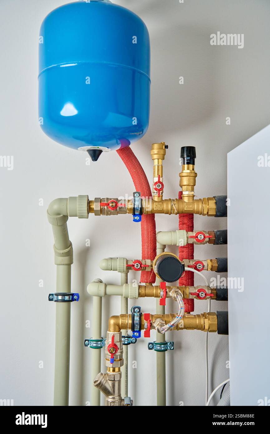 Closed heating system featuring expansion tank, pipes, and shut-off ...