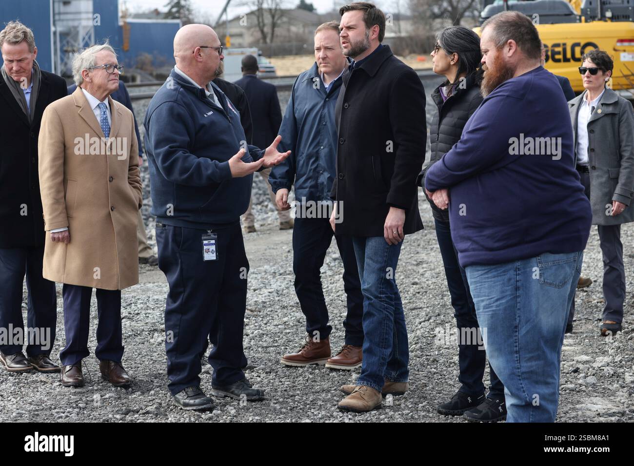 Vice President JD Vance, center, speaks with East Palestine Fire Chief ...