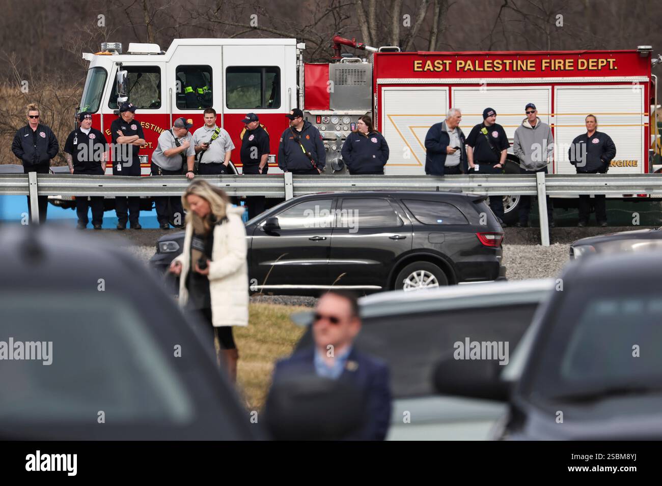 First responders and firefighters look on as Vice President JD Vance ...