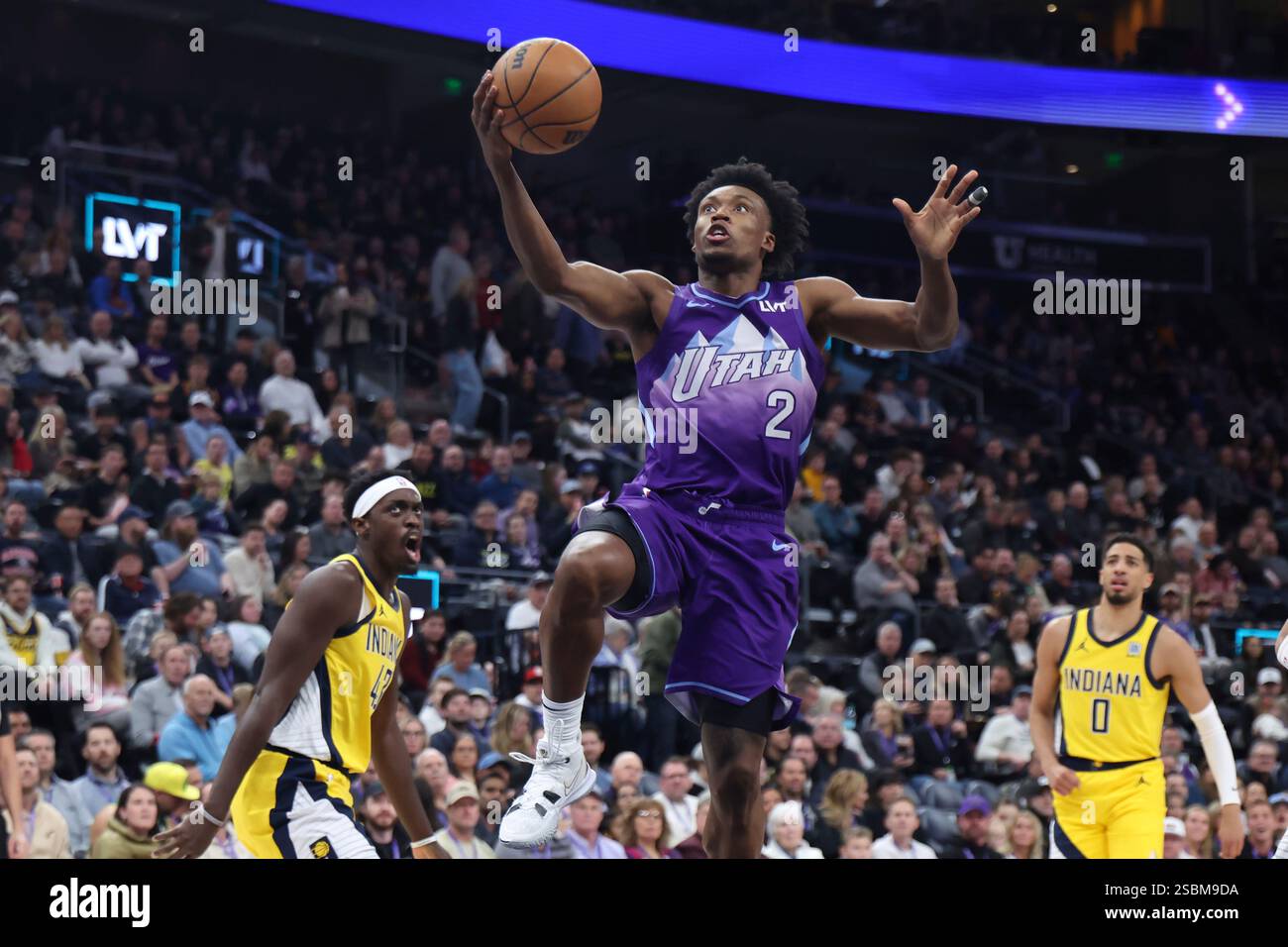Utah Jazz guard Collin Sexton (2) lays up the ball against the Indiana ...